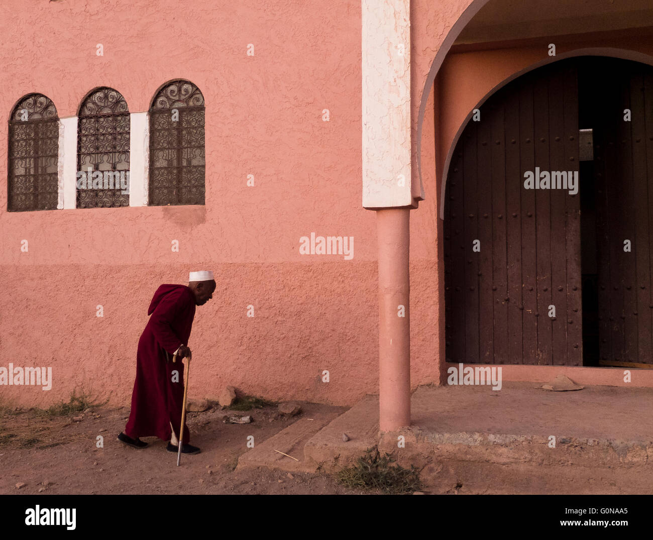 Man going to the mosque for the pray in Timidarte Stock Photo - Alamy