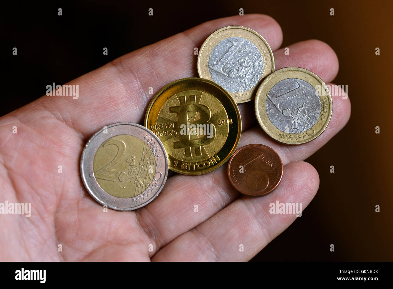 illustration-a-bitcoin-and-euro-coins-are-photographed-during-the