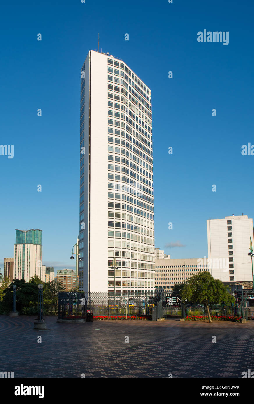 tall and narrow office block, known as the Alpha Tower, in the centre ...
