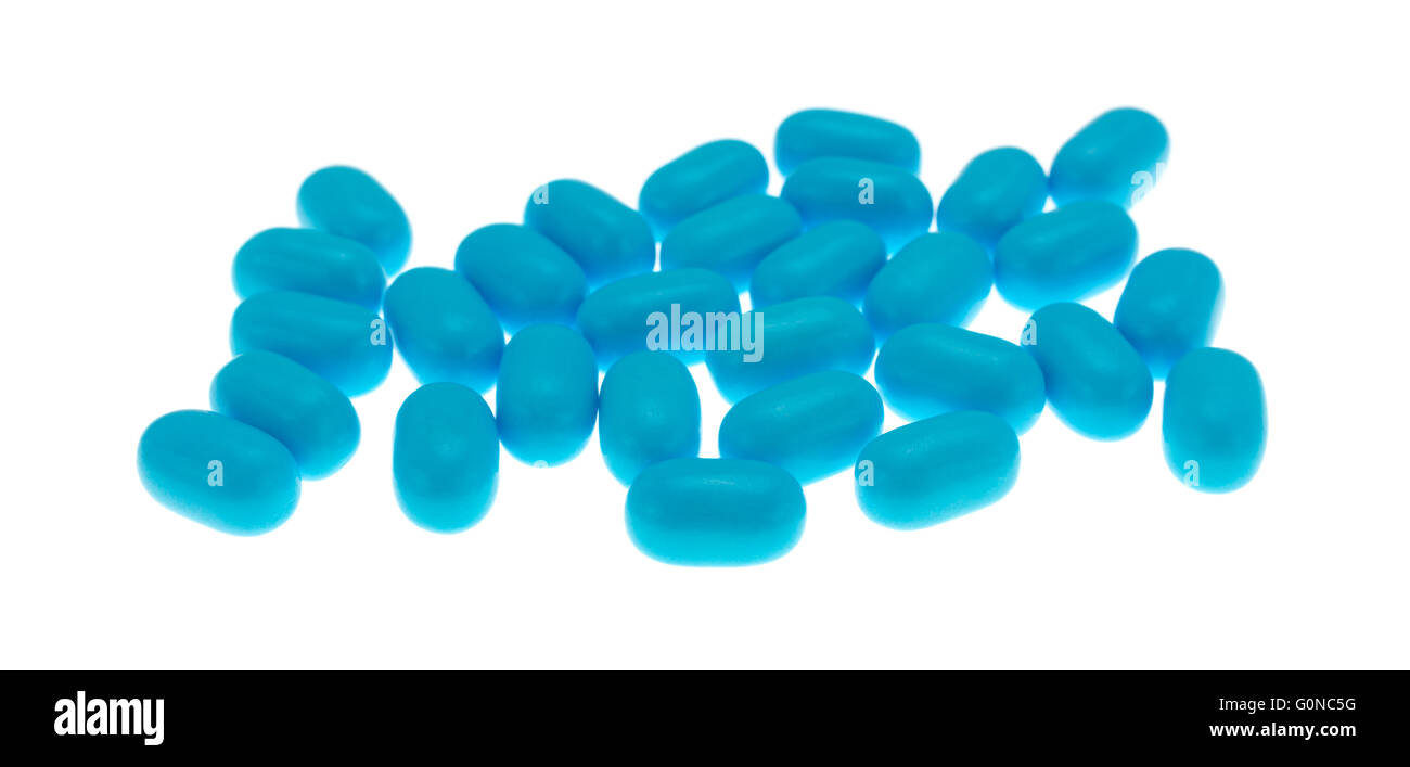 Side view of several blue pills isolated on a white background Stock ...