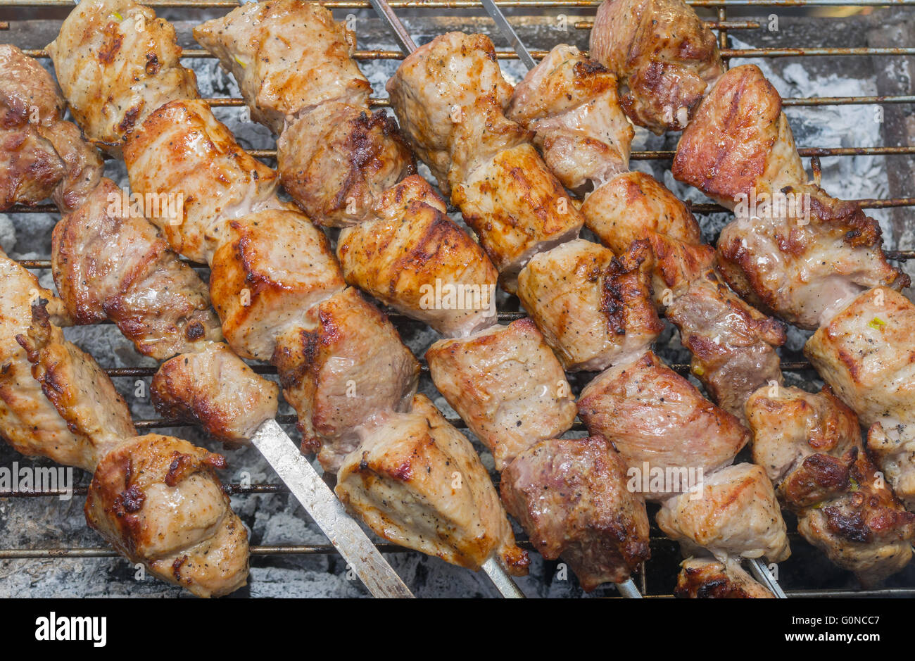Shashlik - Georgian meal with meat cooked outdoor on smouldering ...