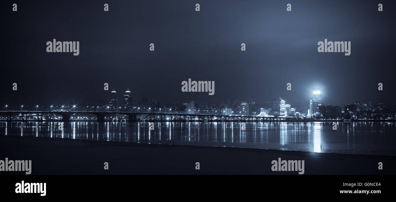 Night Skyline of Dnipropetrovsk with Reflection in the river Dnipro ...