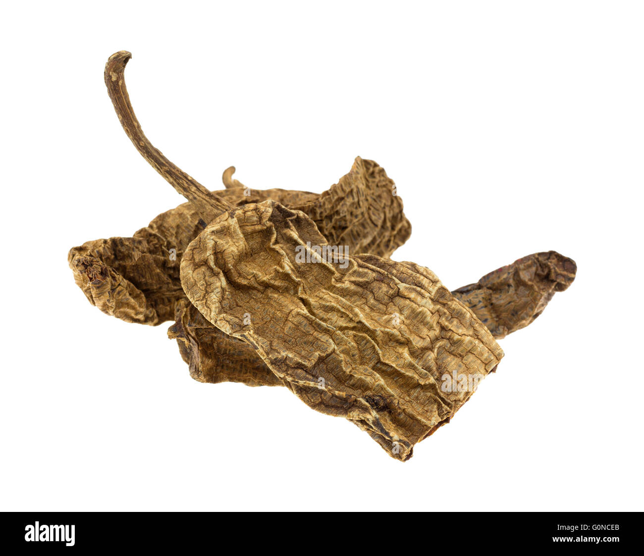 Side view of dried chipotle chile peppers isolated on a white ...
