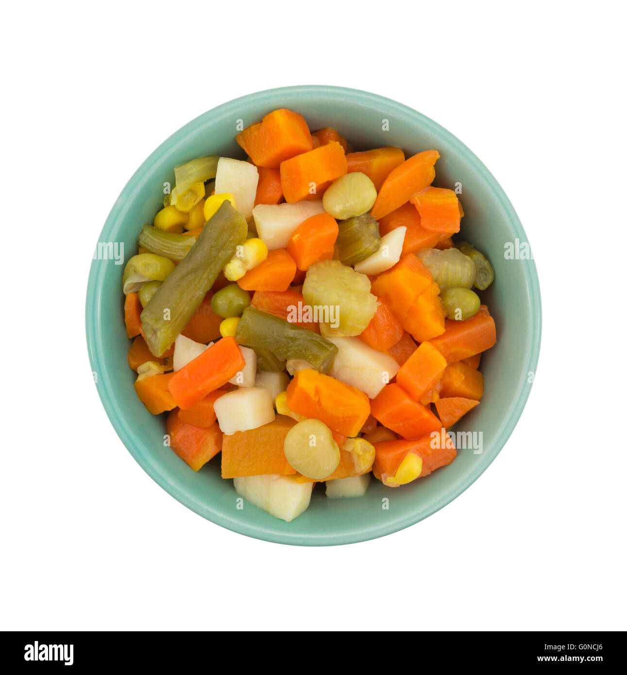 Top view of a portion of mixed vegetables in a small bowl isolated on a ...