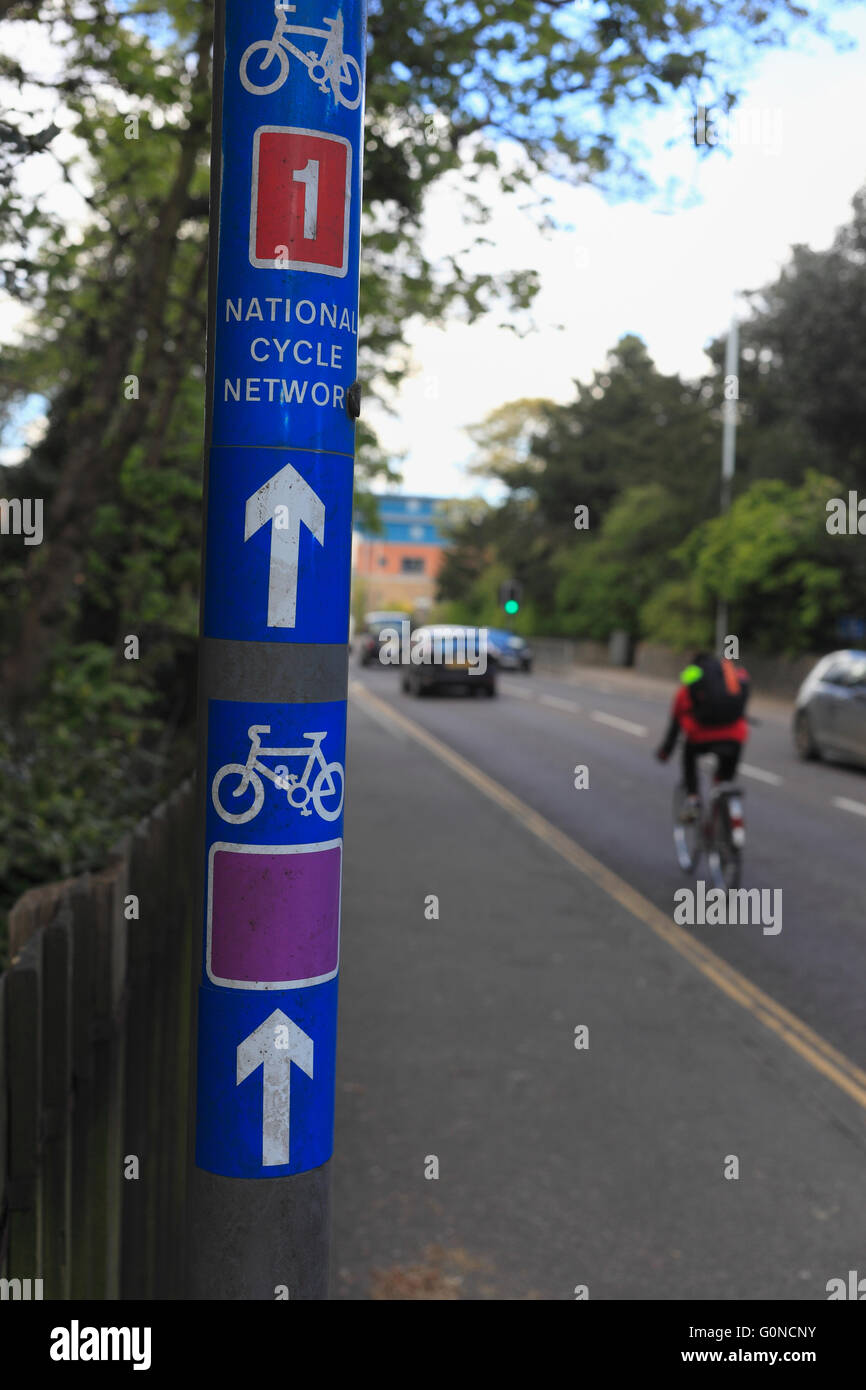 Urban cyclist and National Cycle Network sign Stock Photo - Alamy