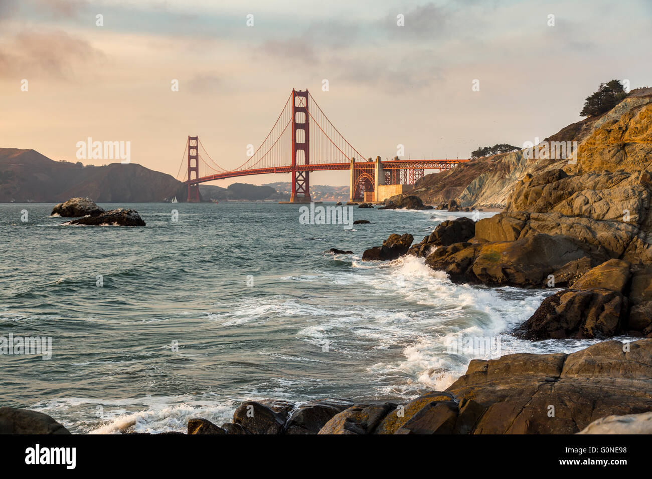 Golden Gate Bridge at sunset shot from Baker Beach Stock Photo - Alamy