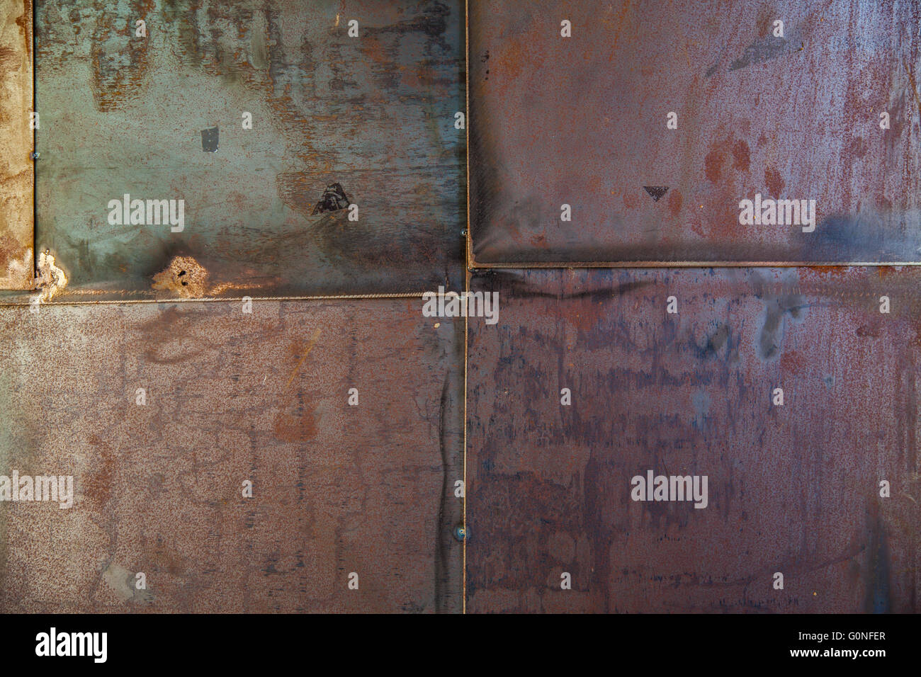A wall made with rusty big panels Stock Photo - Alamy