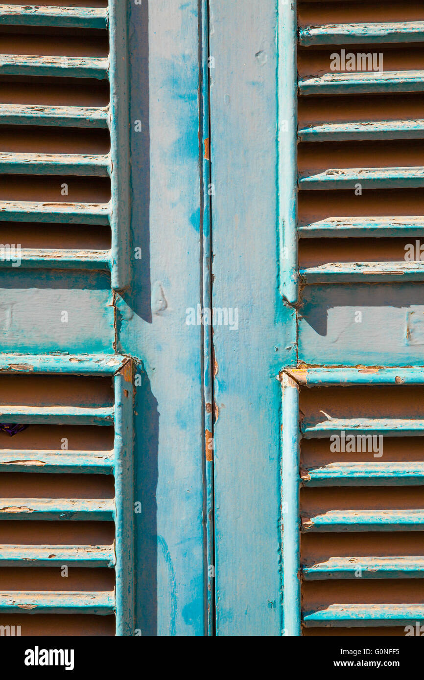 A cyan rusty window made with wood panel Stock Photo - Alamy