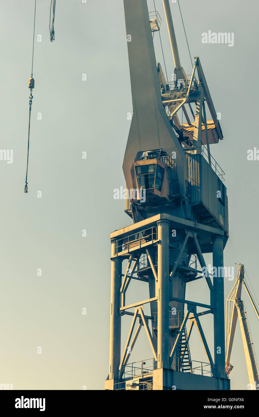 Cockpit of port crane, industry detail. Blue sky background Stock Photo ...