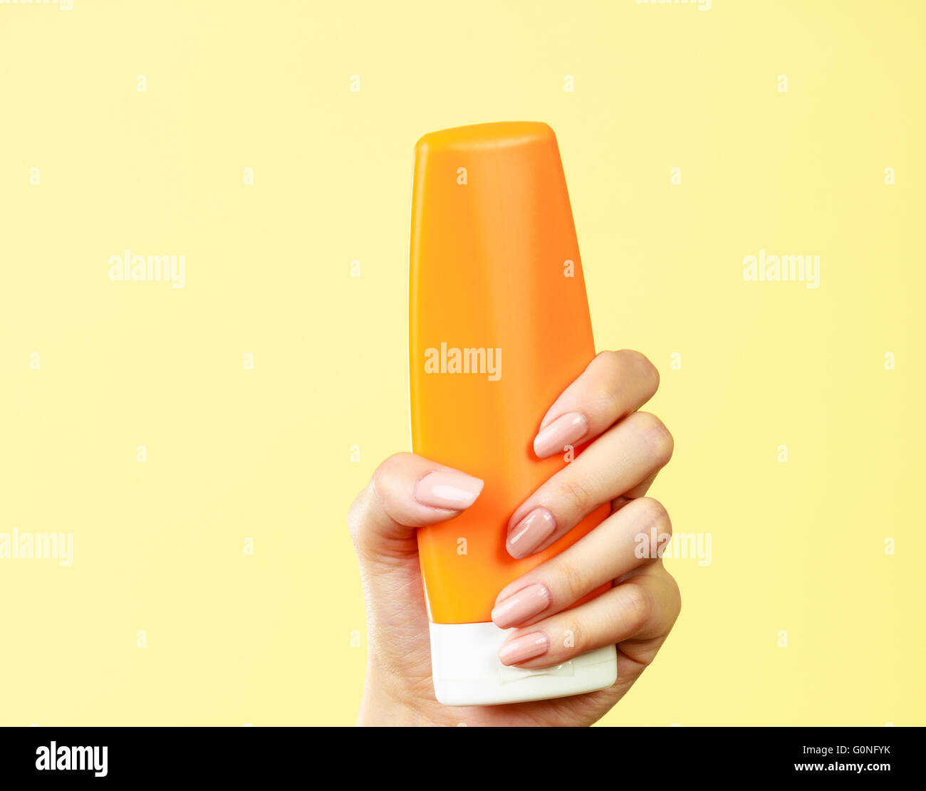 Holidays summer and skin care concept. Woman holding in hand sunscreen ...