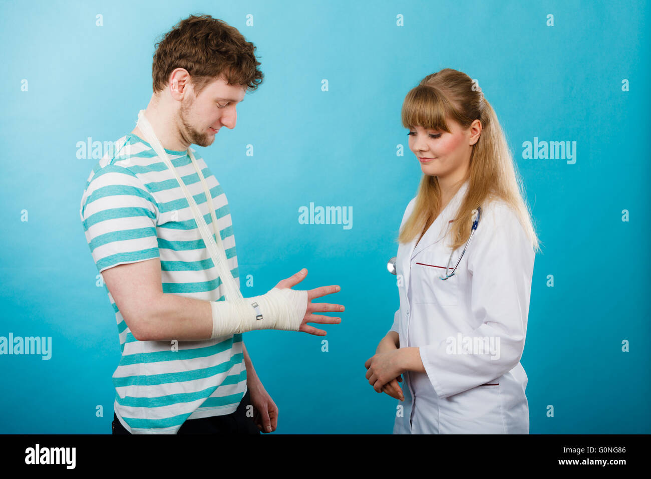 Healthcare and protection. Young man with broken hand sprained wrist ...
