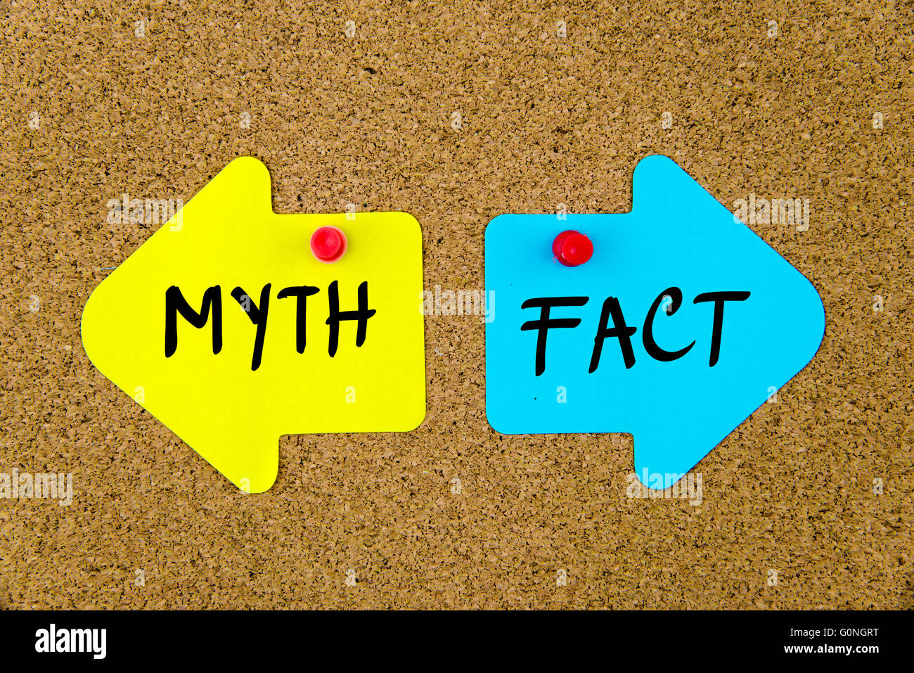 Conceptual message on yellow and blue paper notes as opposite arrows ...