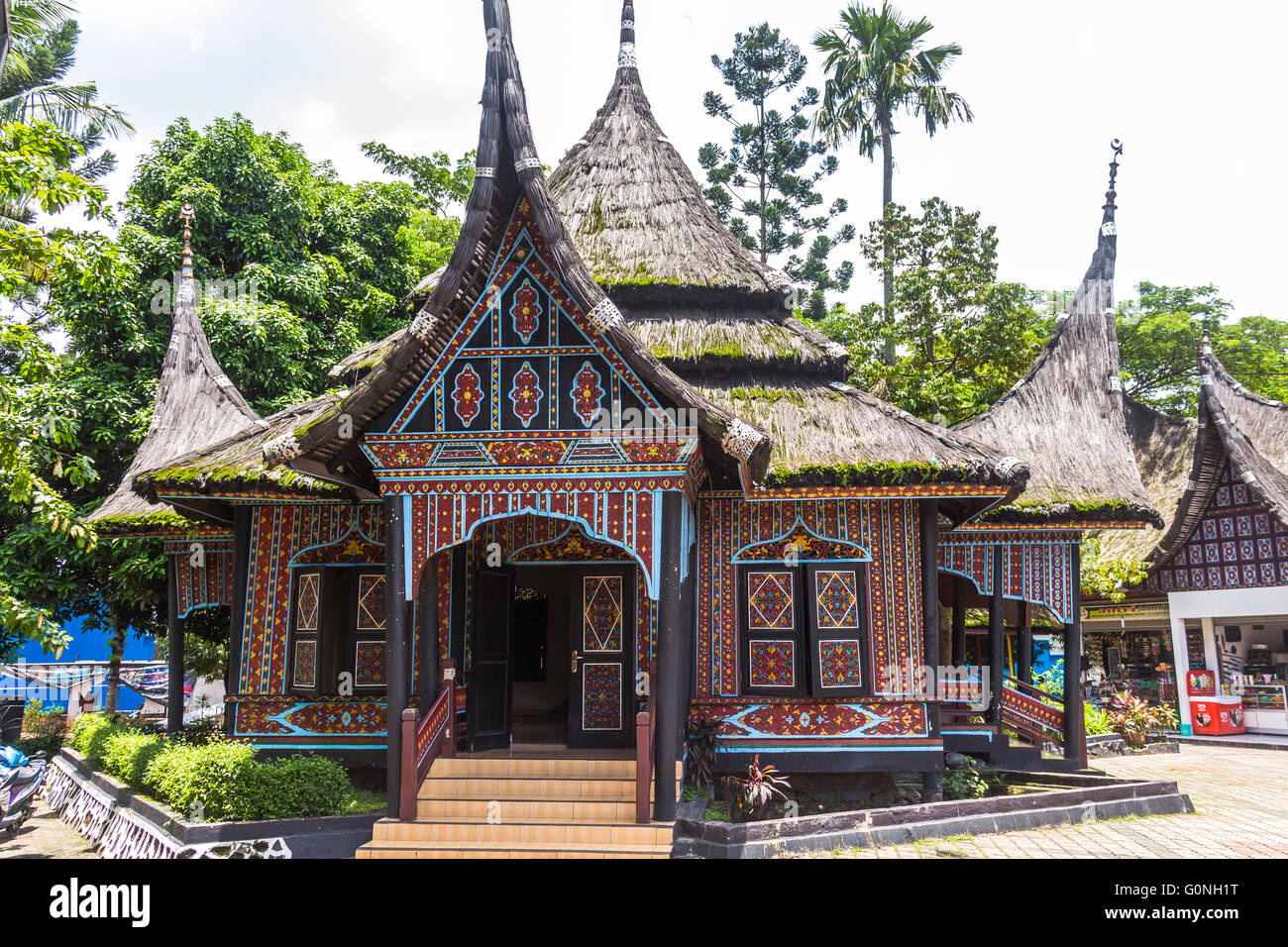 Traditional indonesian houses in Taman Mini Park Stock Photo - Alamy