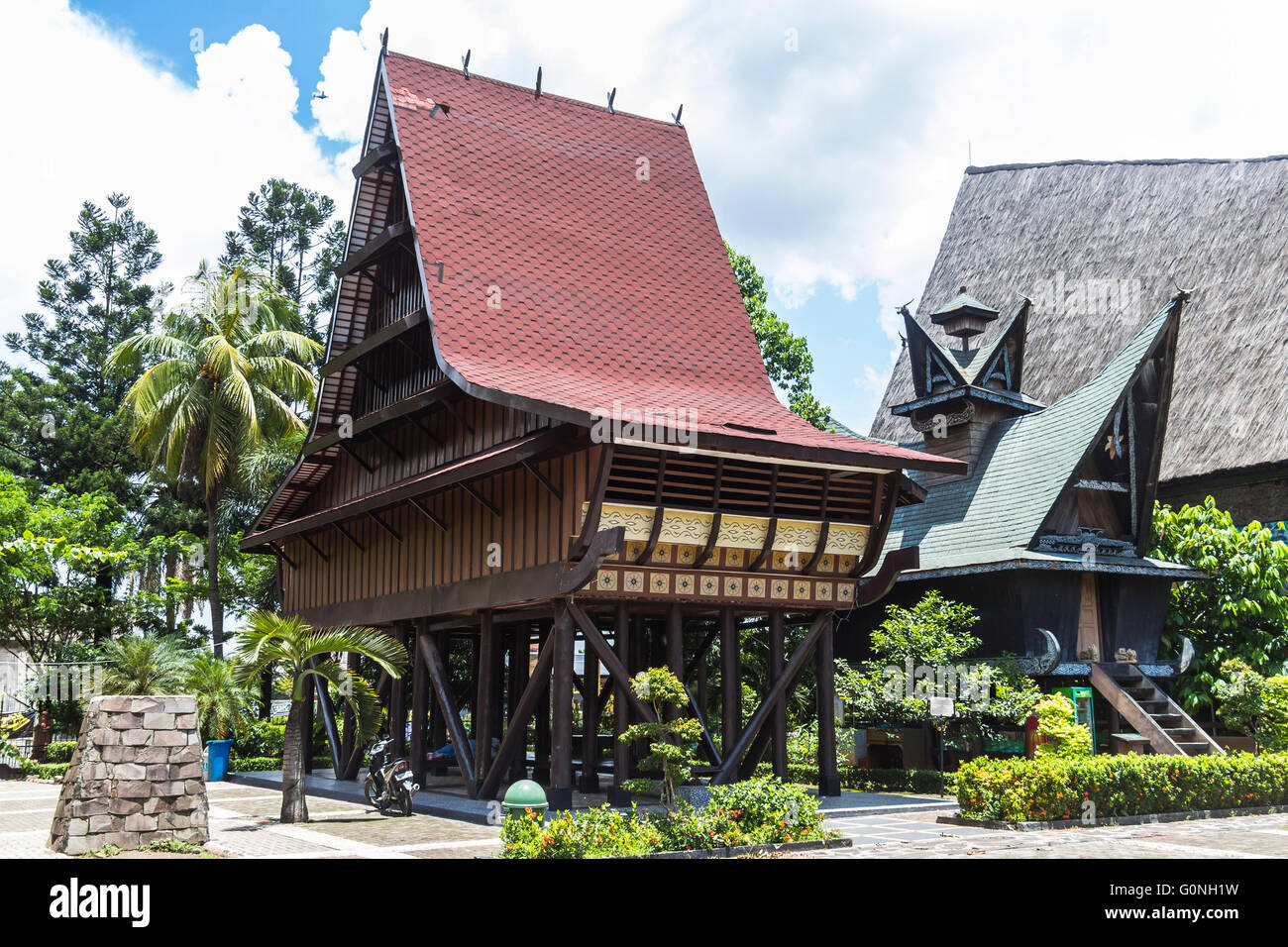 Traditional indonesian houses in Taman Mini Park Stock Photo - Alamy