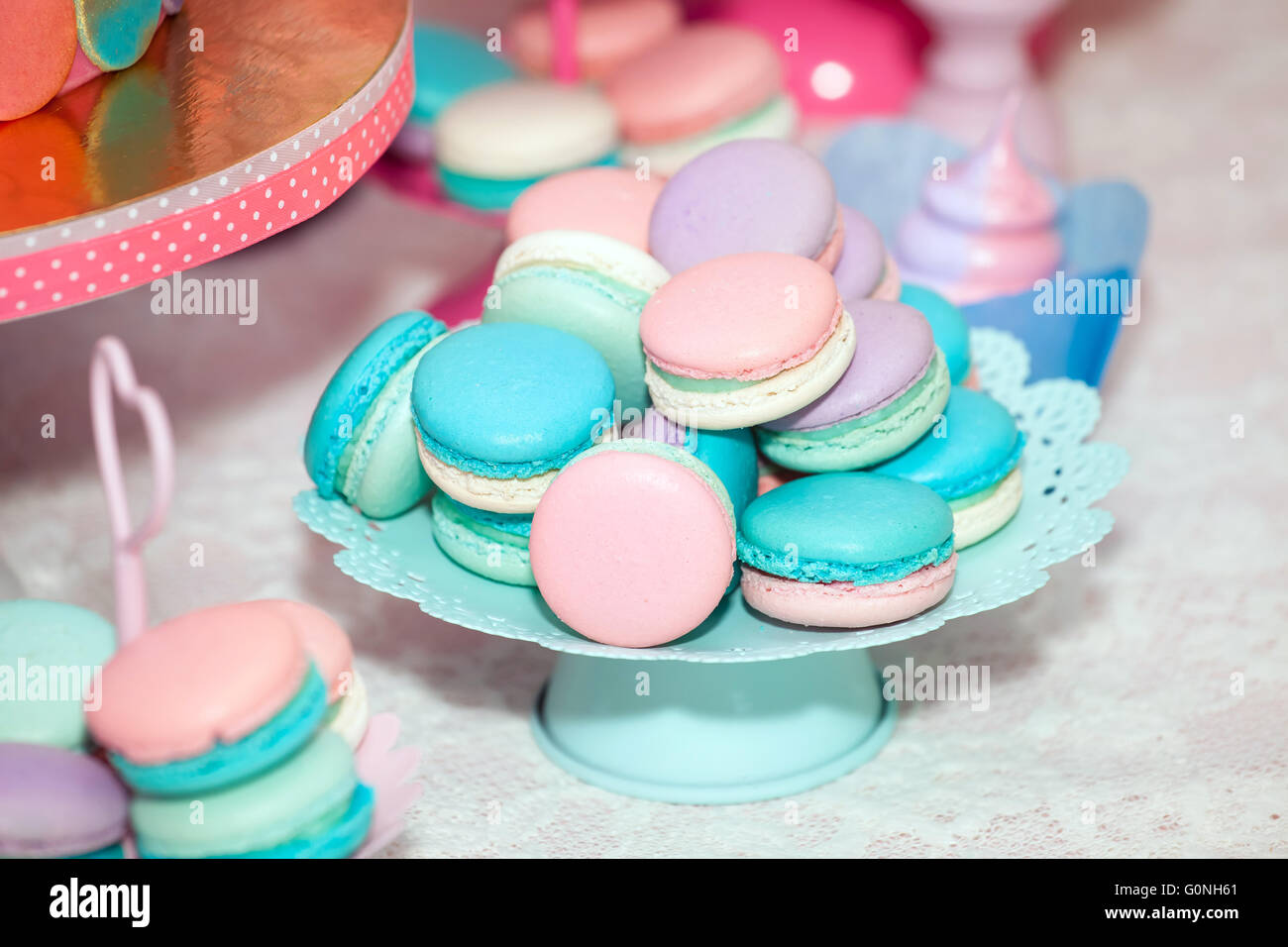 Colorful macaroons on the plate Stock Photo - Alamy