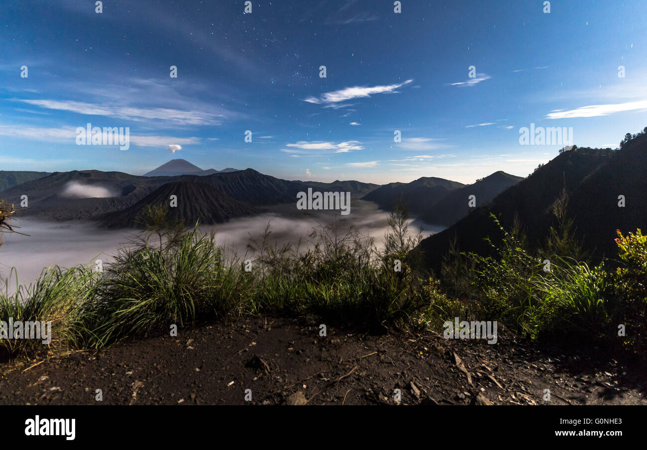 View over Mount Bromo landscape at night Stock Photo - Alamy