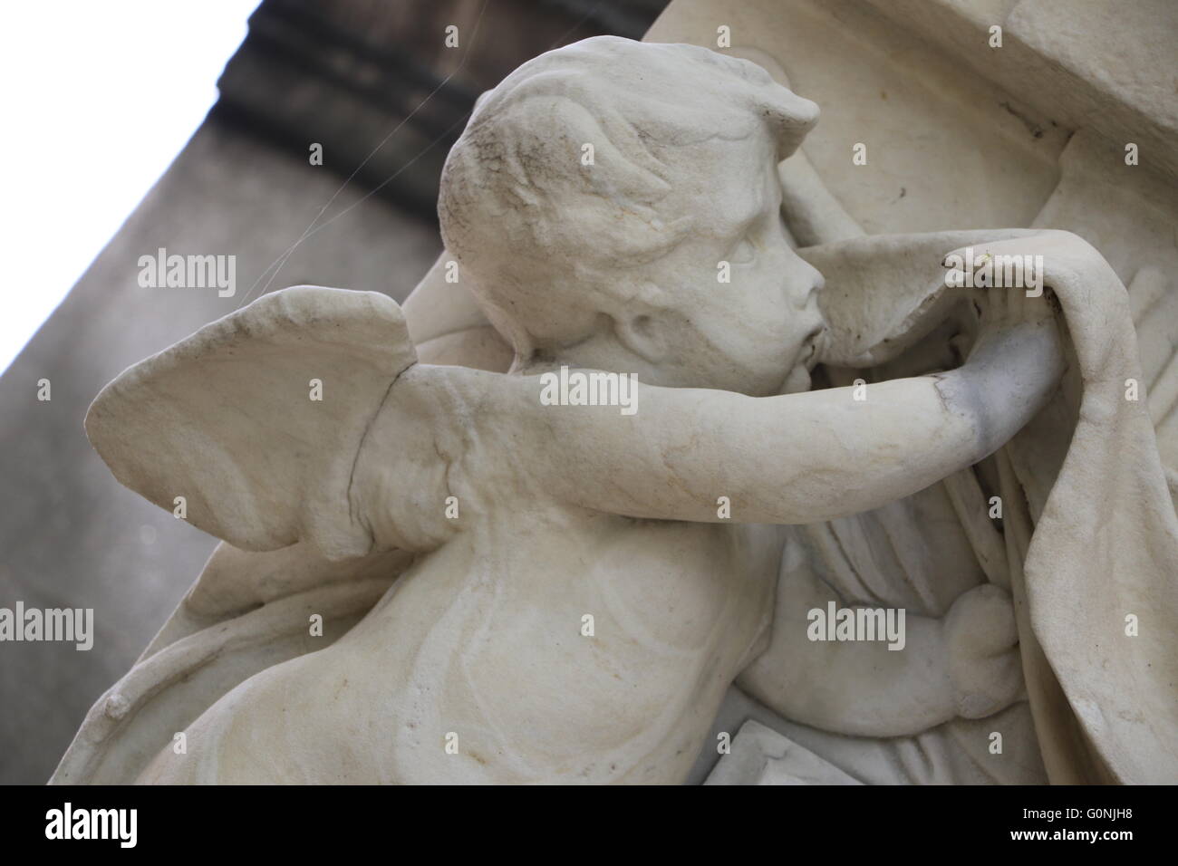 Angel of a grave of the Pere Lachaise Cemetery in Paris Stock Photo - Alamy
