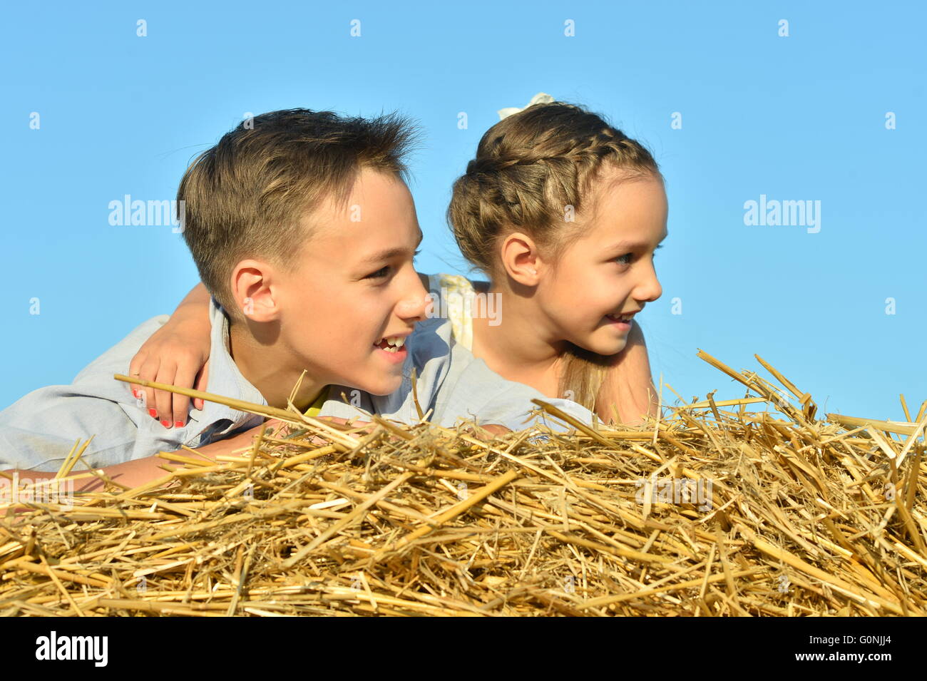happy kids in field at summer Stock Photo - Alamy