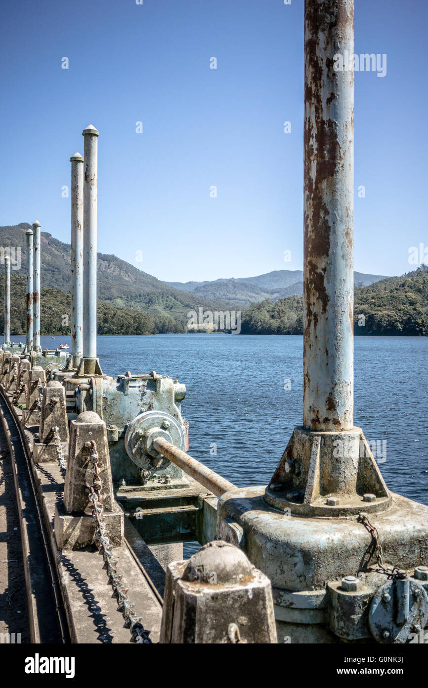 Mattupetty Dam with tranquil river and mountains behind Stock Photo - Alamy