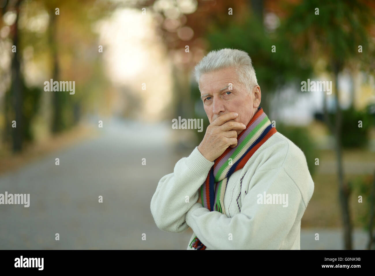 Senior man thinking Stock Photo - Alamy