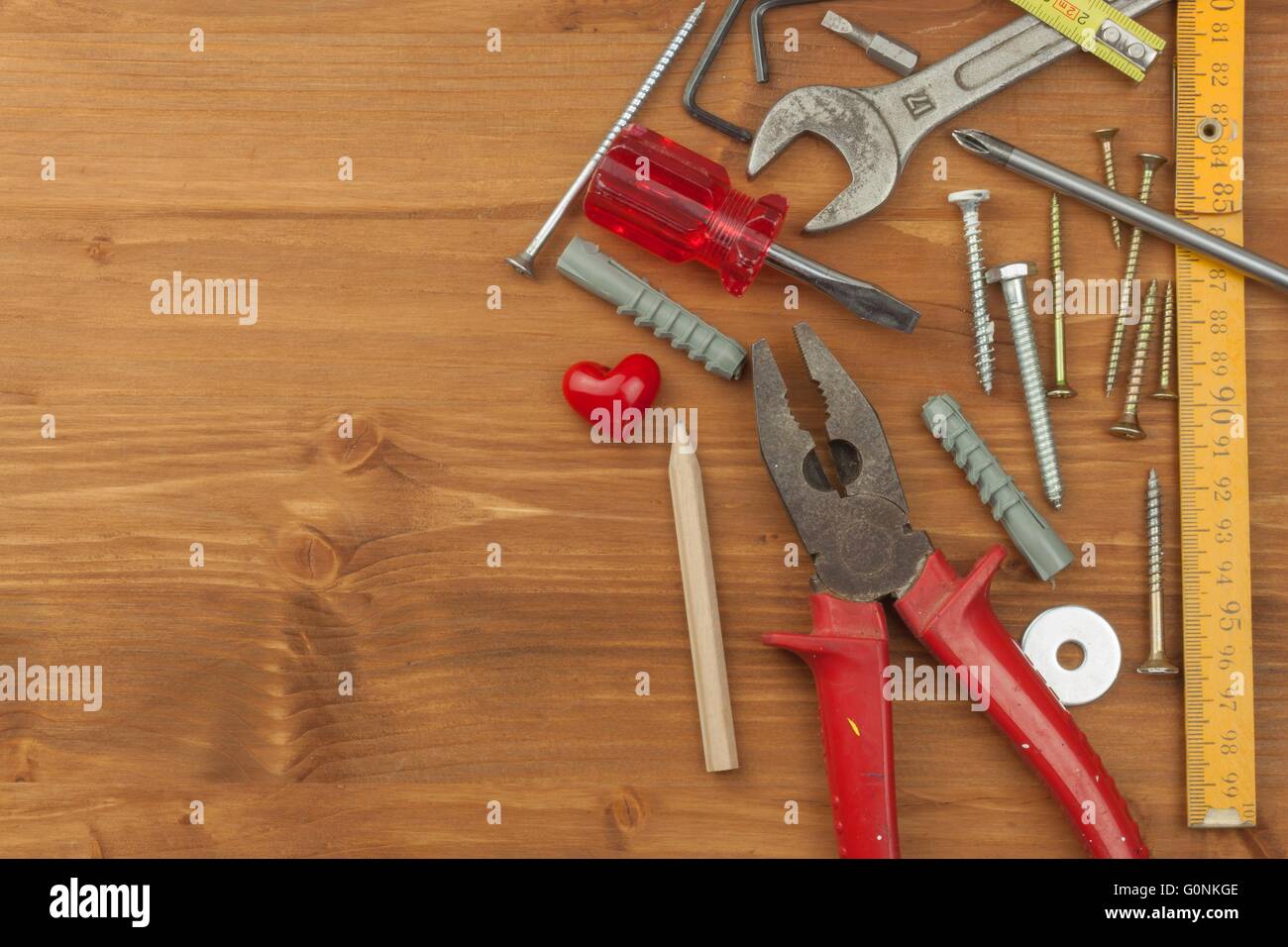 Set of tools and instruments on wooden background. Different kinds of ...
