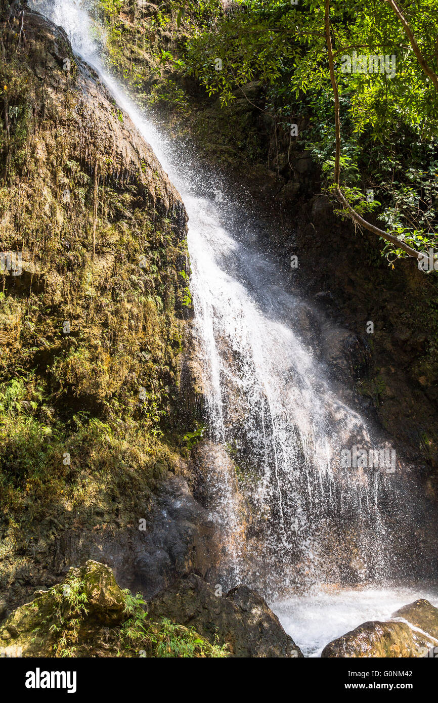 Tall waterfall floating inside water pool, Indonesia Stock Photo - Alamy
