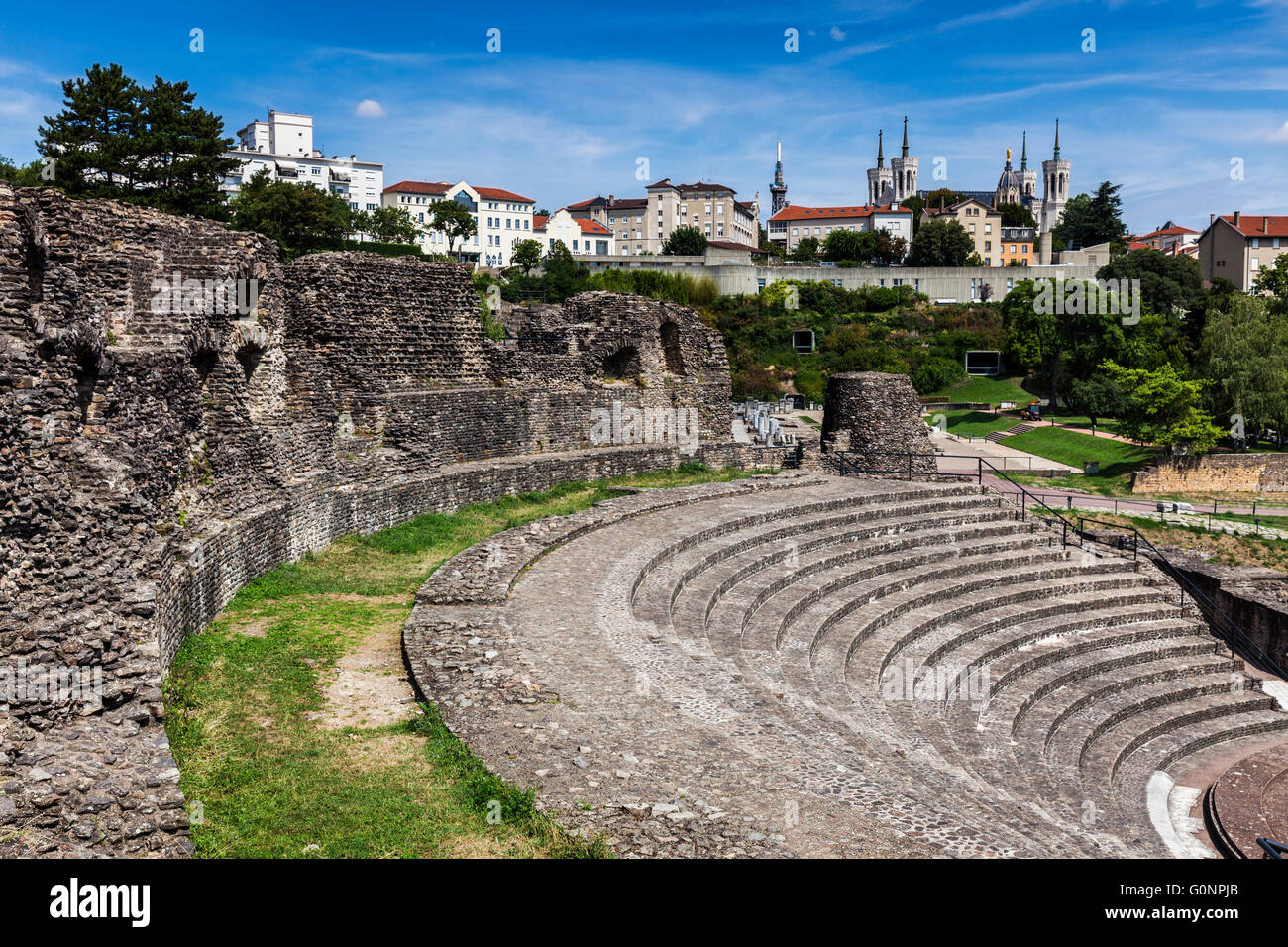 Ruins of Roman Theatre in Lyon. Basilica of Notre-Dame de Fourviere in ...