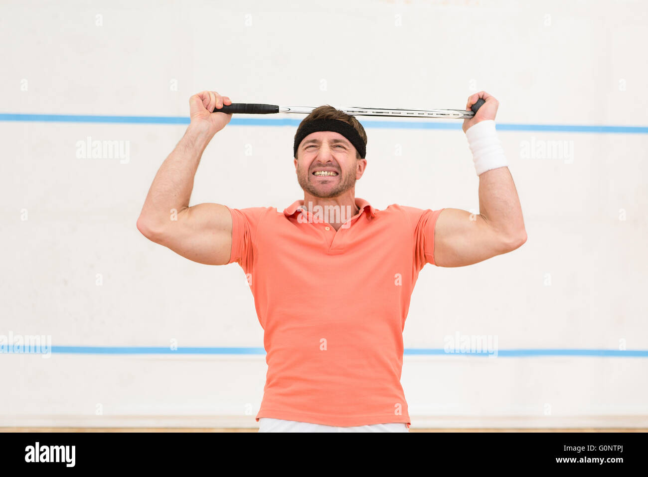 Squash player man Stock Photo - Alamy