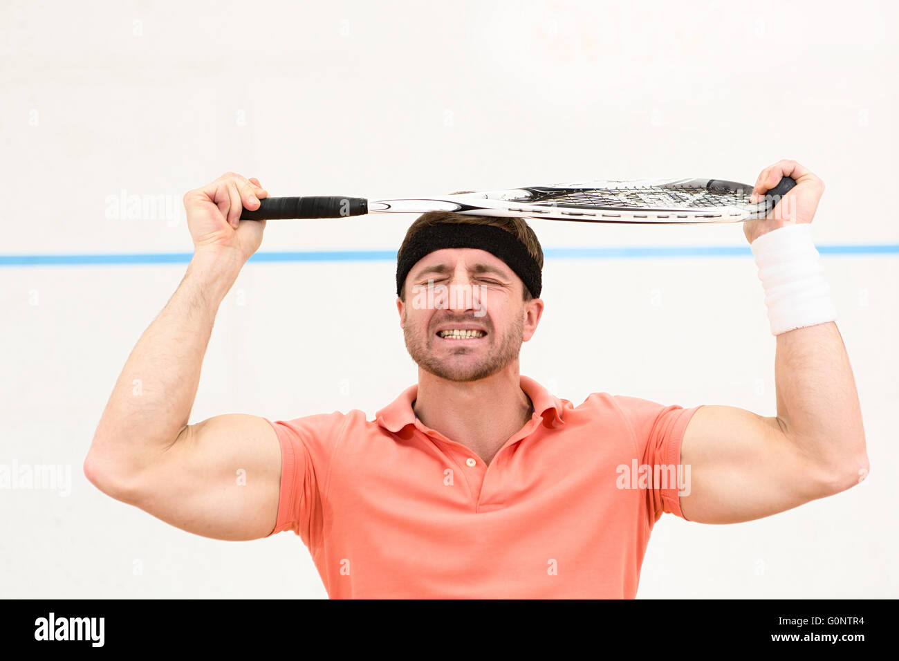 Squash player man Stock Photo - Alamy