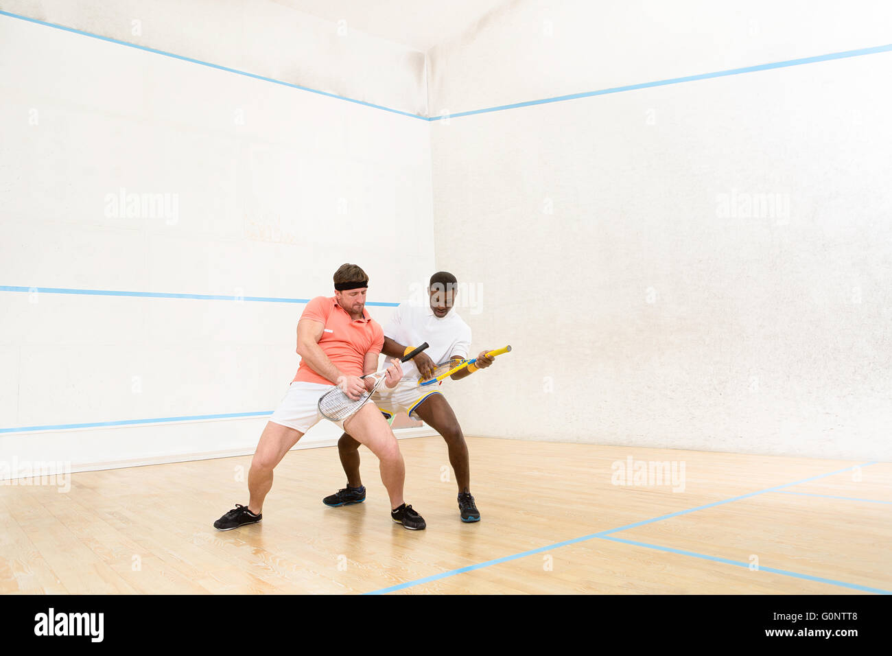 Two men playing squash hi-res stock photography and images - Alamy