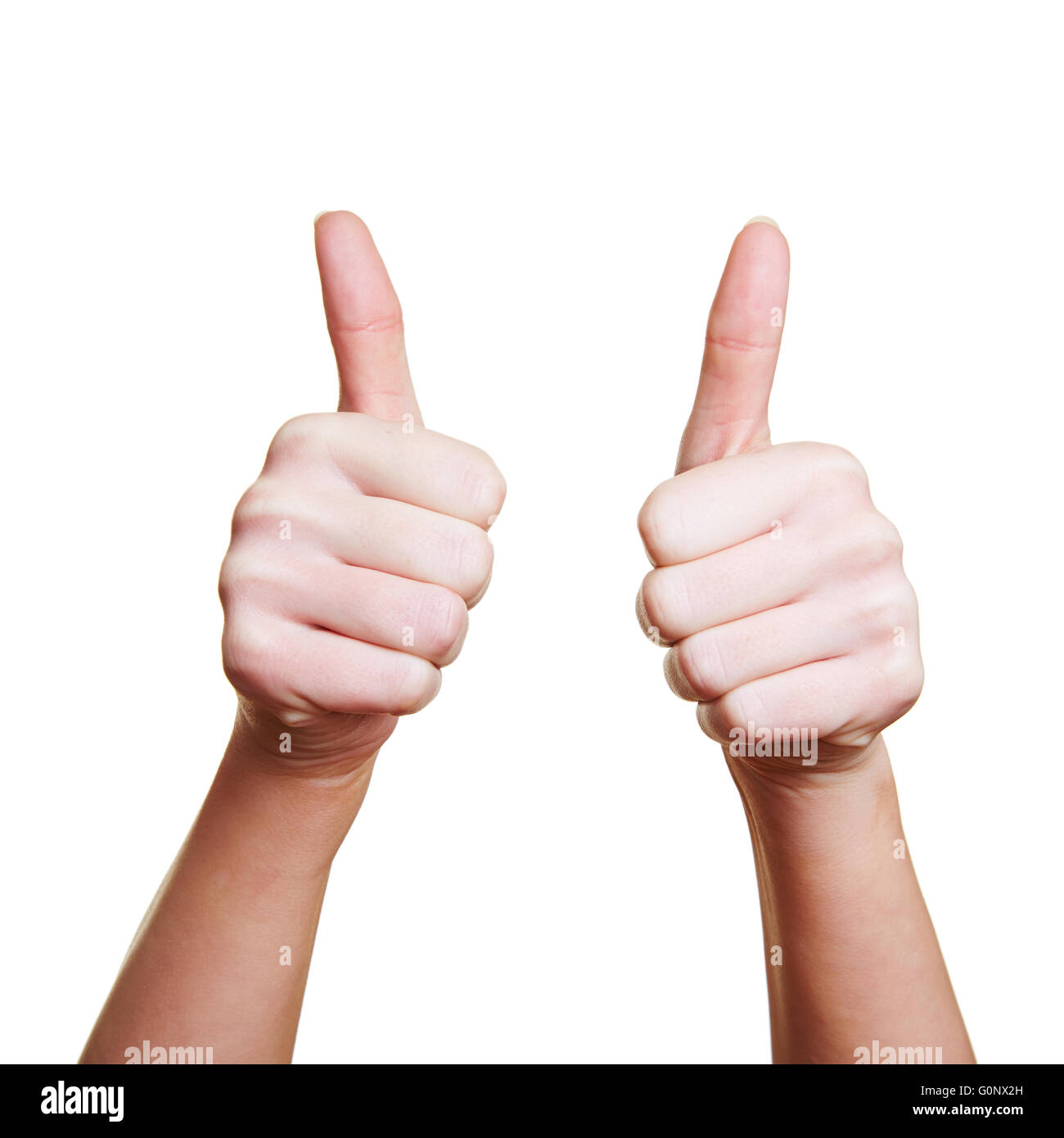 Woman holding both her thumbs up high Stock Photo - Alamy