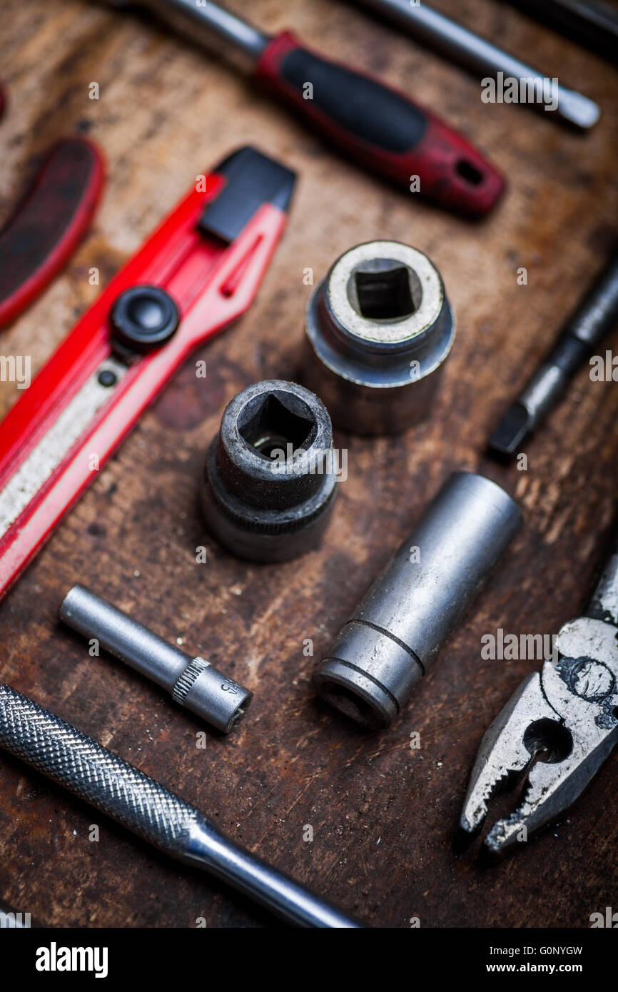 Color image of many tools on a wooden plank Stock Photo - Alamy