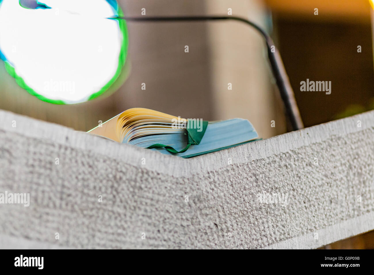 holy book on concrete lectern Stock Photo - Alamy