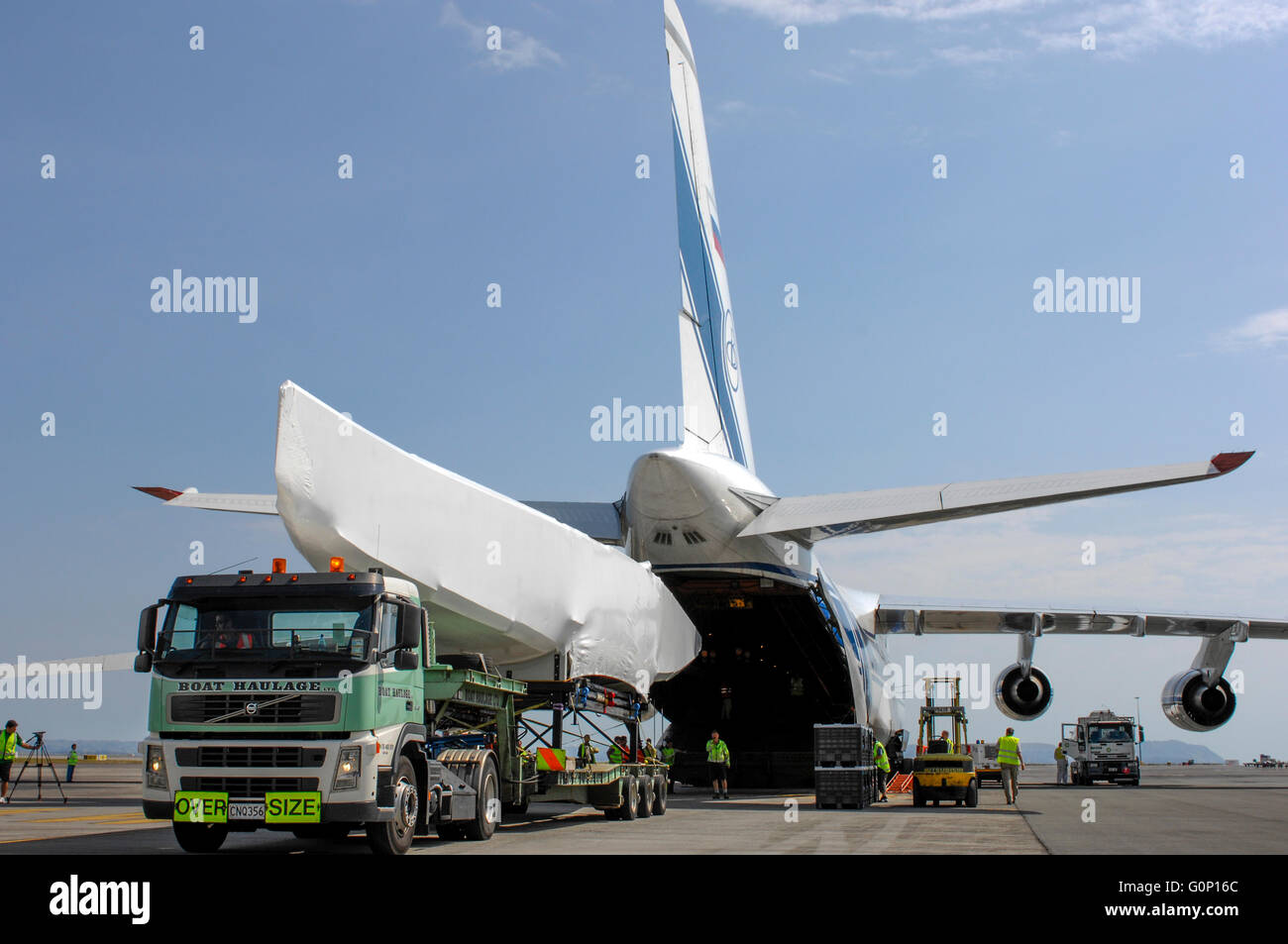 Yacht hull being loaded into the cargo bay through the rear doors of ...