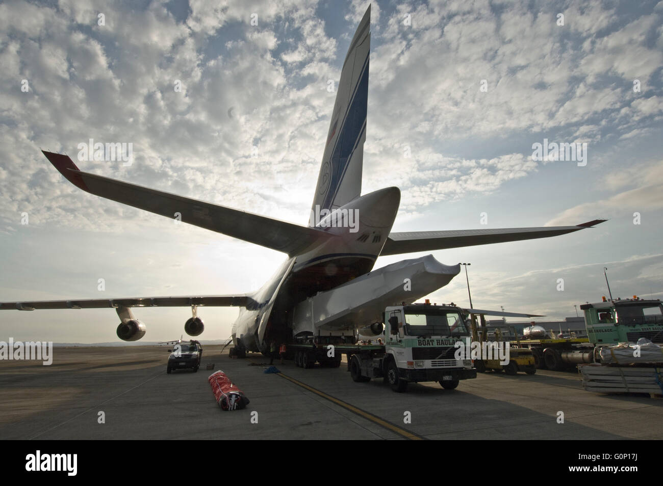 Yacht hull being loaded into the cargo bay through the rear doors of ...