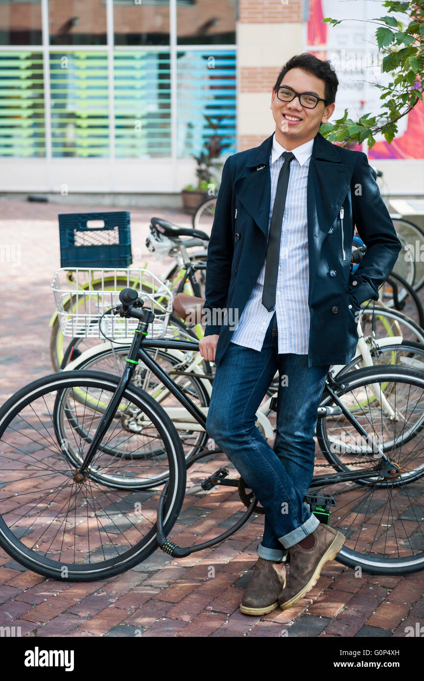 Asian male and bike hi-res stock photography and images - Alamy
