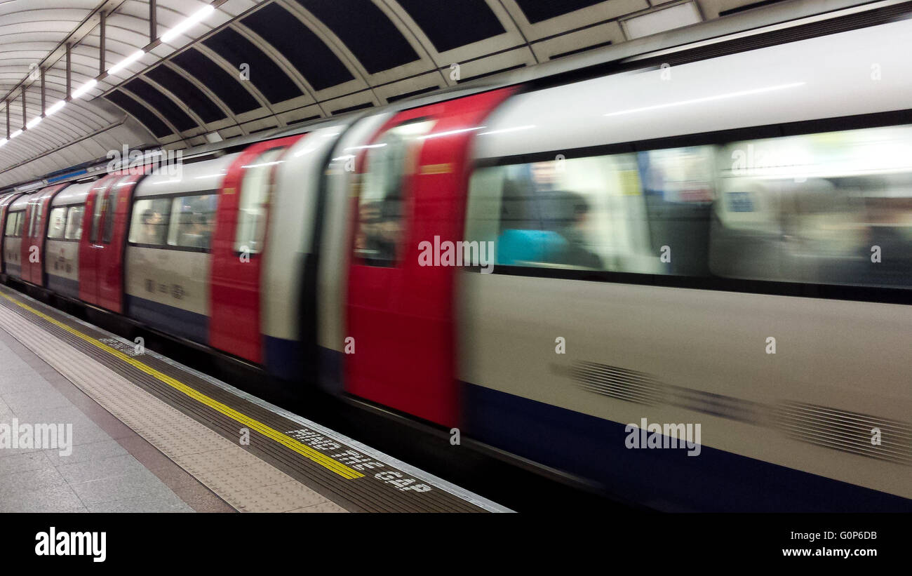 Train arrives at Angel Underground Station platform, Islington, London ...