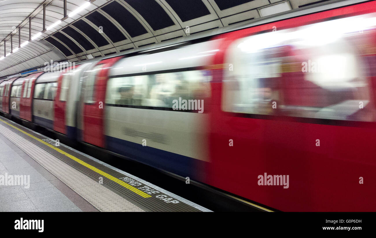 Train arrives at Angel Underground Station platform, Islington, London ...