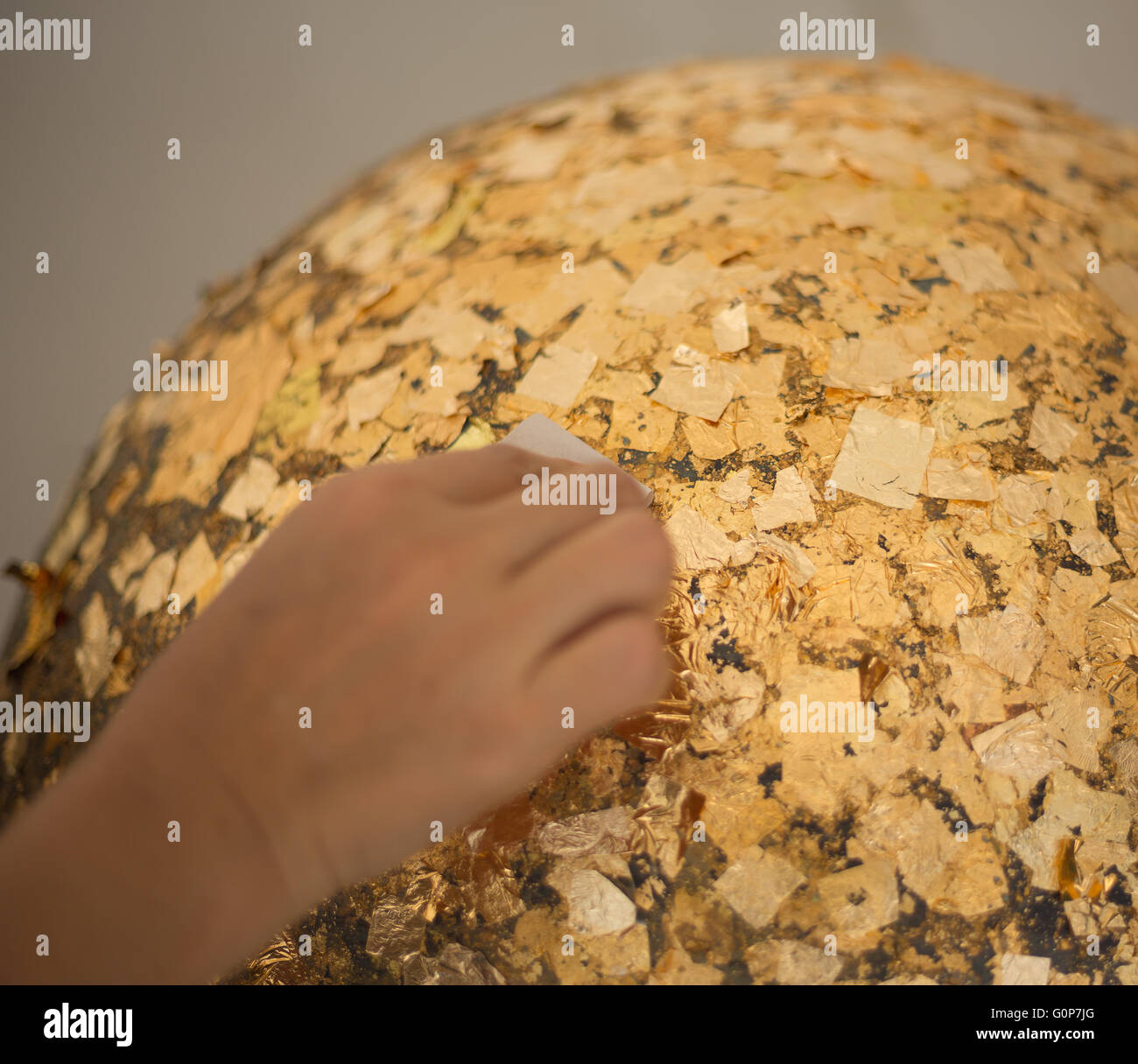 Gilded Buddha activities faith in Buddhism Stock Photo - Alamy