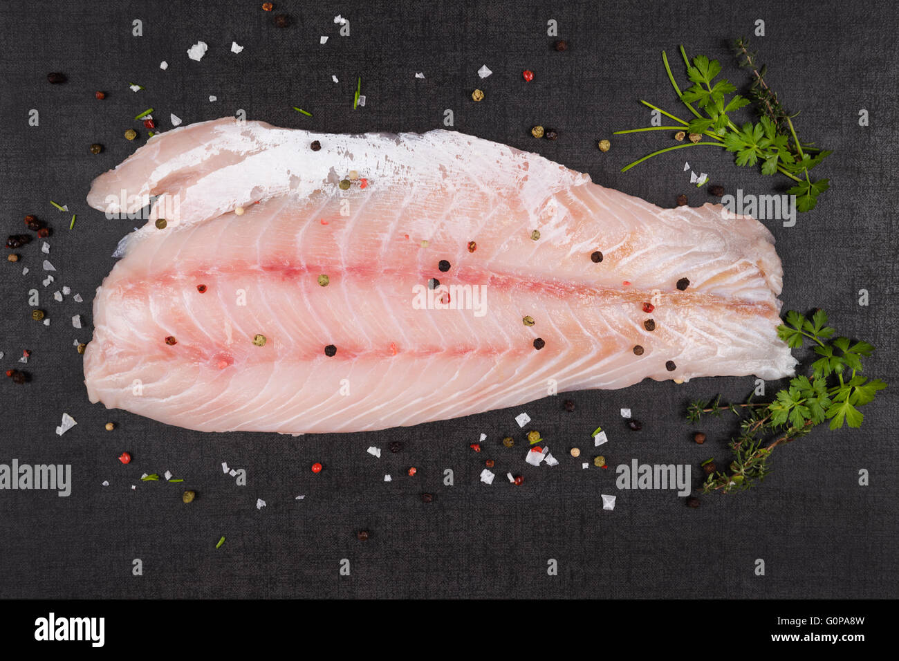 Luxurious perch fillet on black background, top view. Culinary fish ...