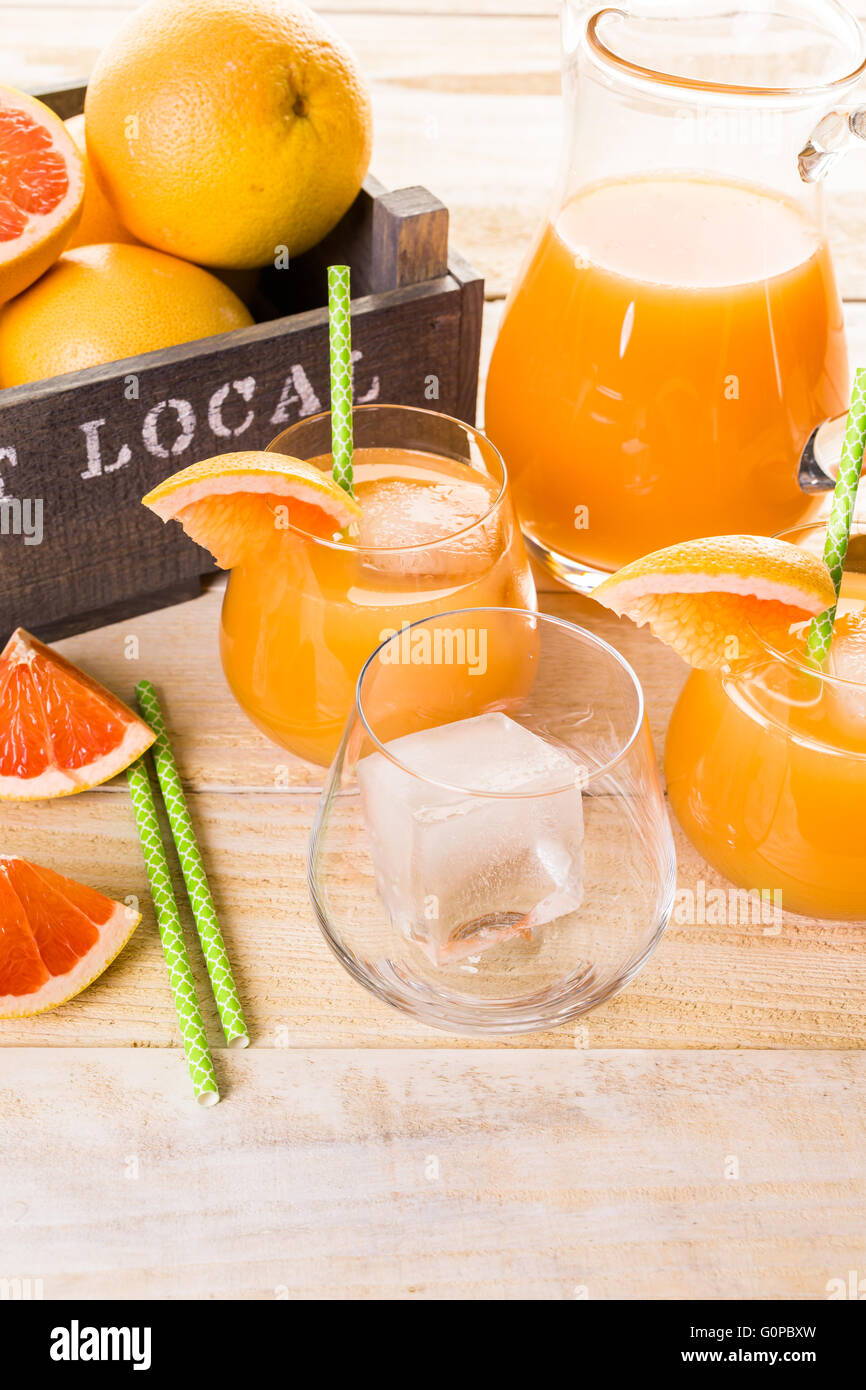 Organic ryby red grapefruit juice in small glass with ice Stock Photo ...