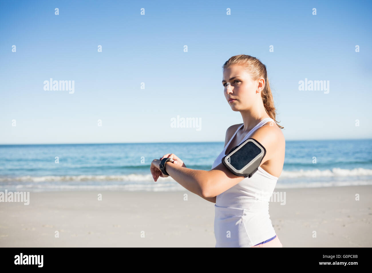 Fit woman on the beach Stock Photo - Alamy
