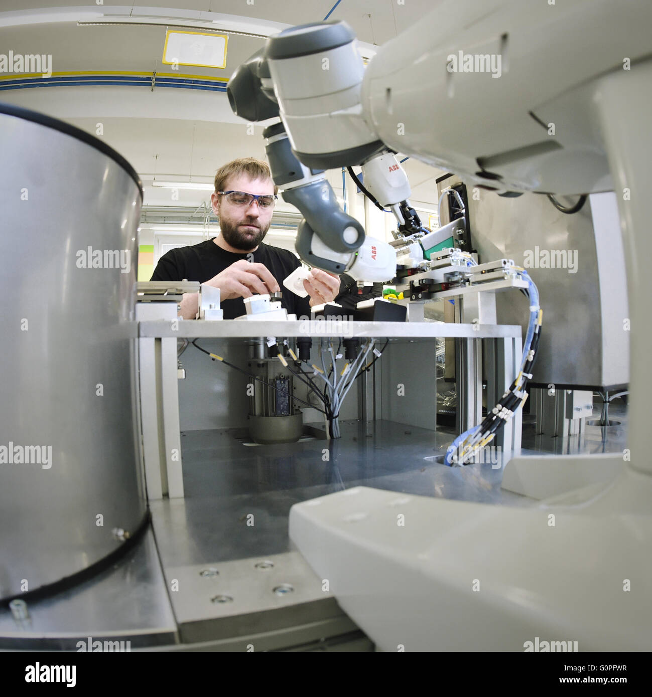 Ceremonial introduction of industrial robot YuMi to production, robot ...