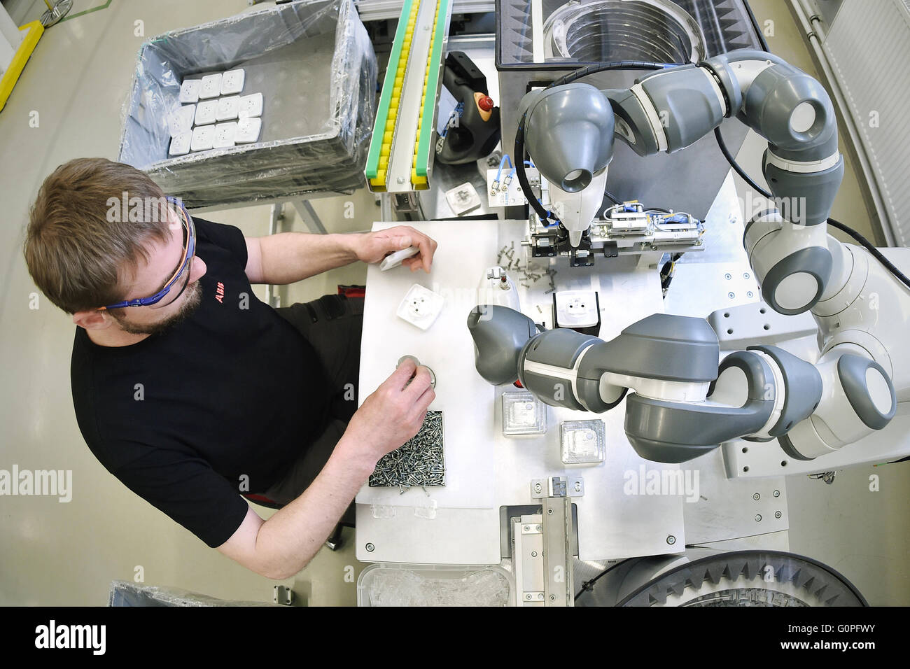 Ceremonial introduction of industrial robot YuMi to production, robot ...
