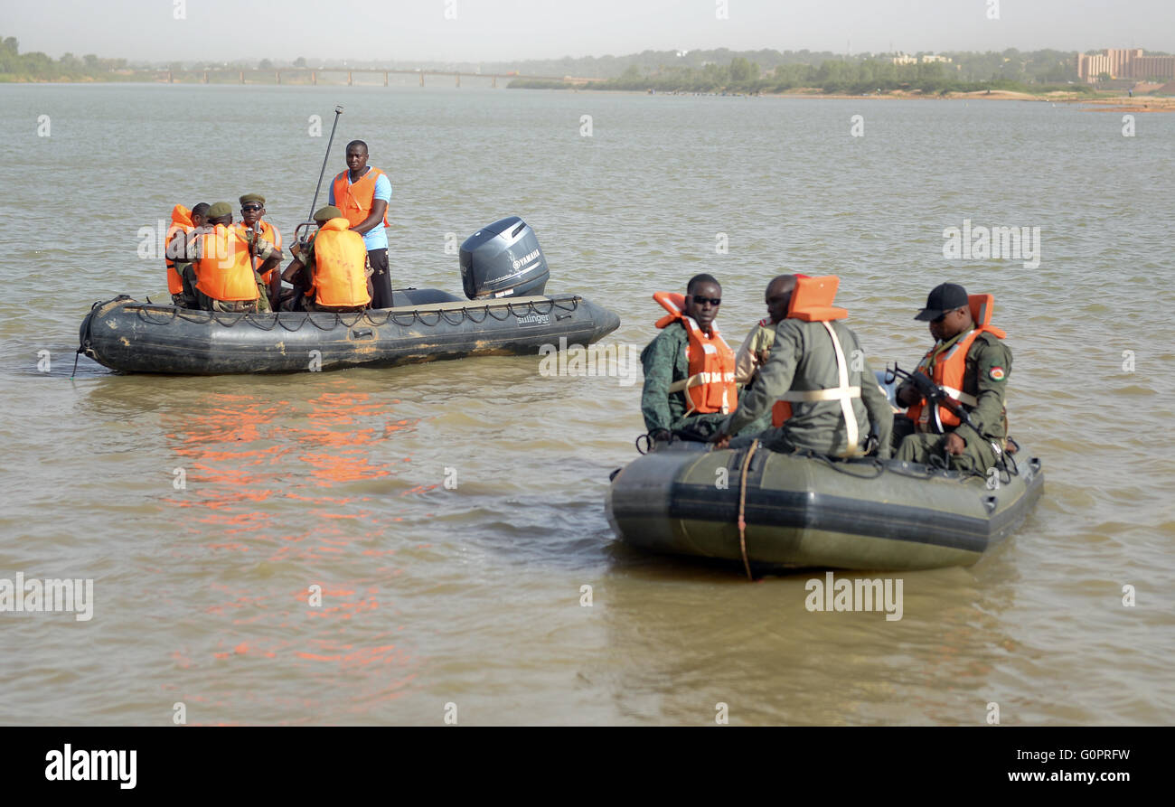 Nigerien security forces ride down the Niger River in Niamey, Niger, 03 ...