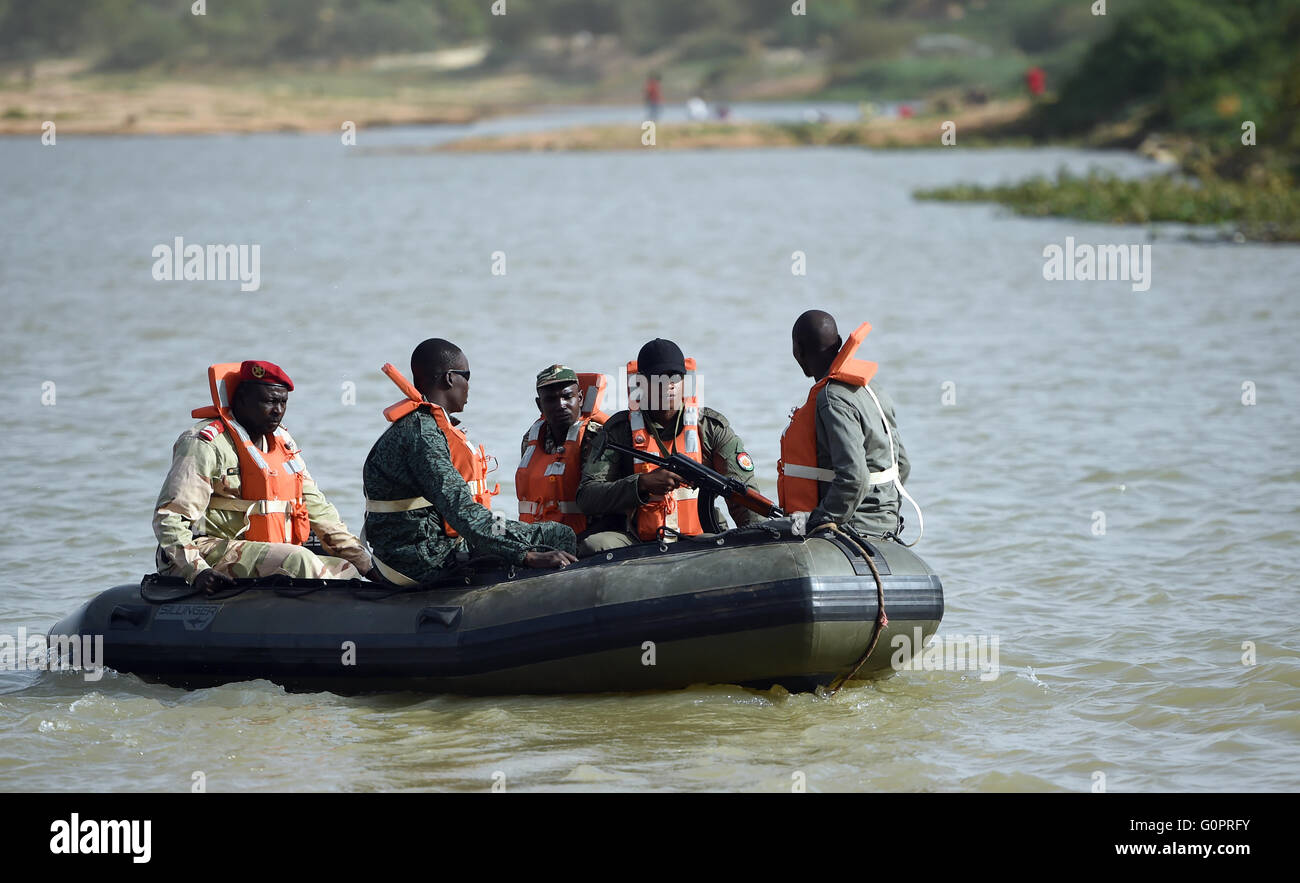 Nigerien security forces ride down the Niger River in Niamey, Niger, 03 ...