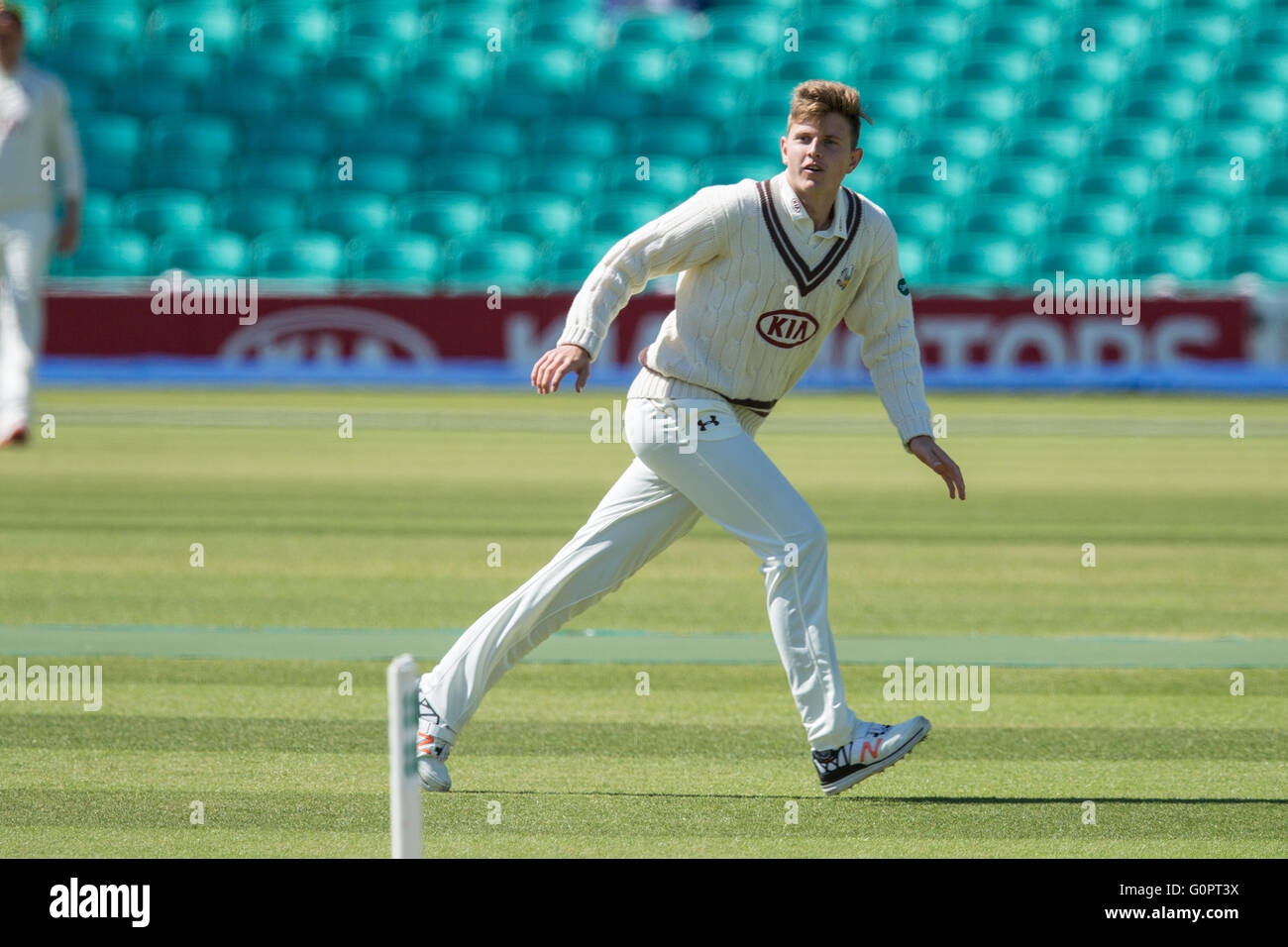 London, UK. 4 May 2016. Conor McKerr fielding for Surrey against Durham ...