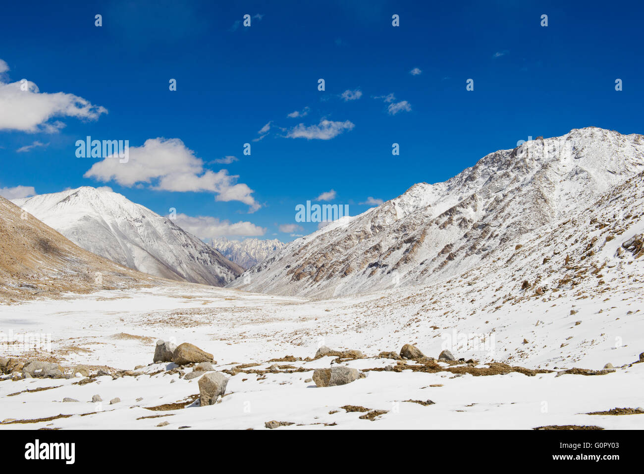 Nice sky with snow hill Stock Photo - Alamy