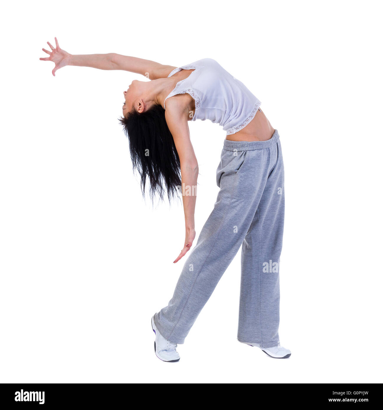 modern style dancer showing some movements against isolated white ...