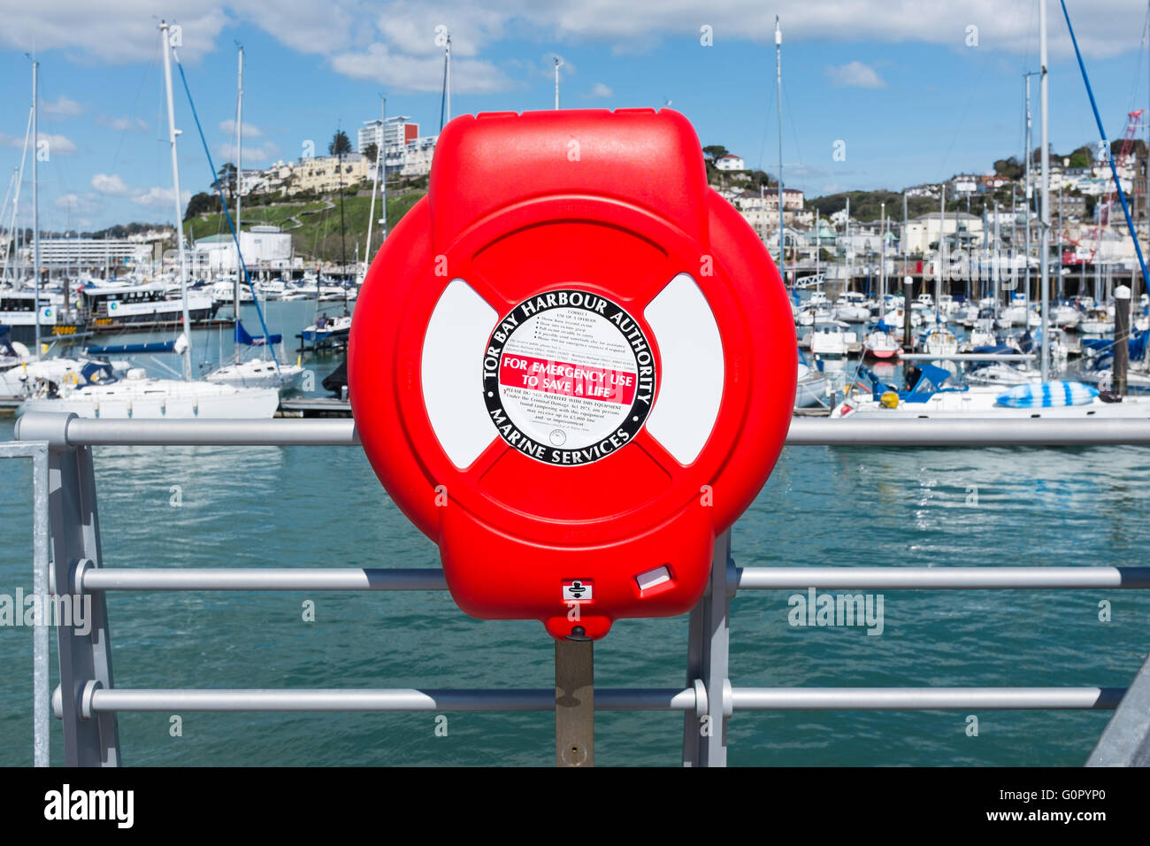 Lifebuoy at Torquay Harbour Stock Photo - Alamy